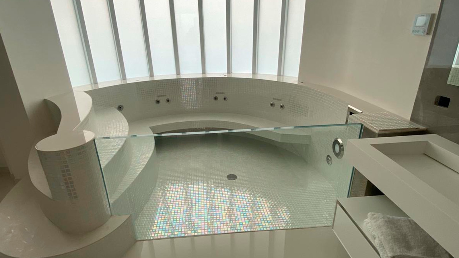 Spectacular jacuzzi bathroom tiled in mosaic